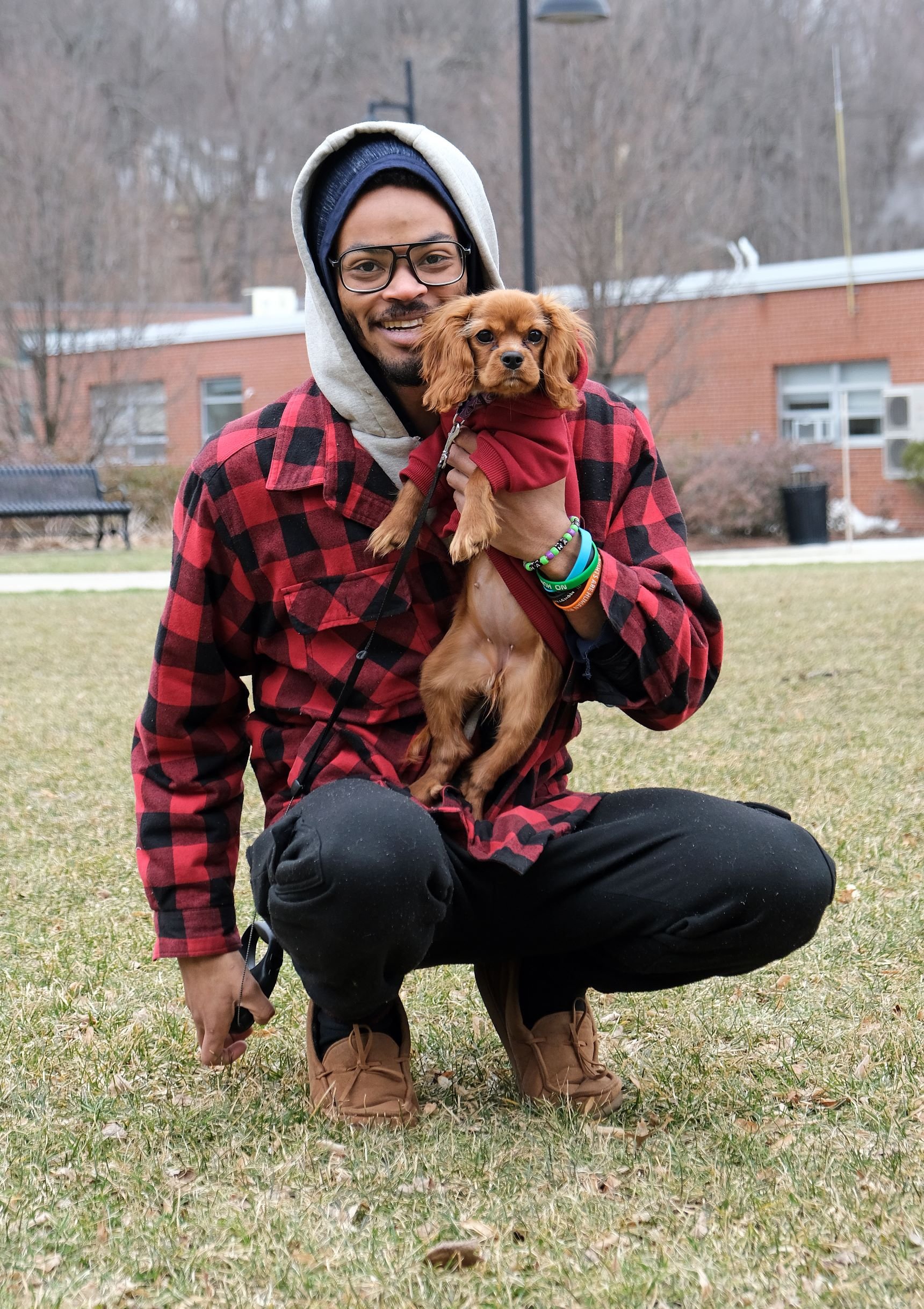 Around Campus - Alumni Walk Dog During Spring Break